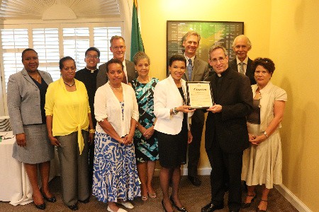 PM Andrew Holness lauds U.S. Priest for his contribution to Jamaica