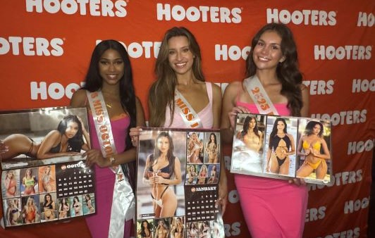 Jamaican Hooters Employee Featured in 2025 Hooters Calendar